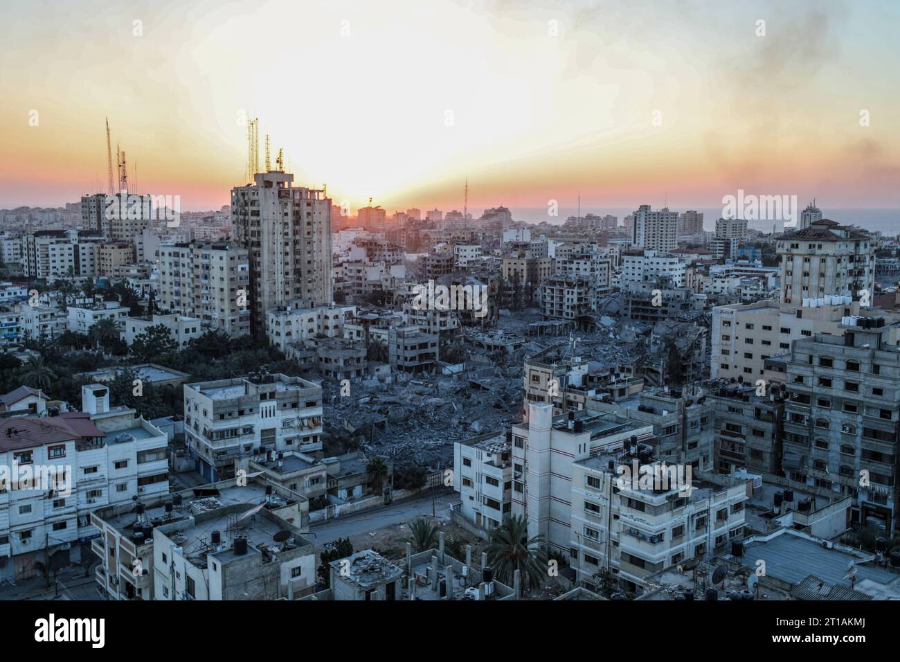 A view of ruins and demolished buildings following Israeli air strikes ...