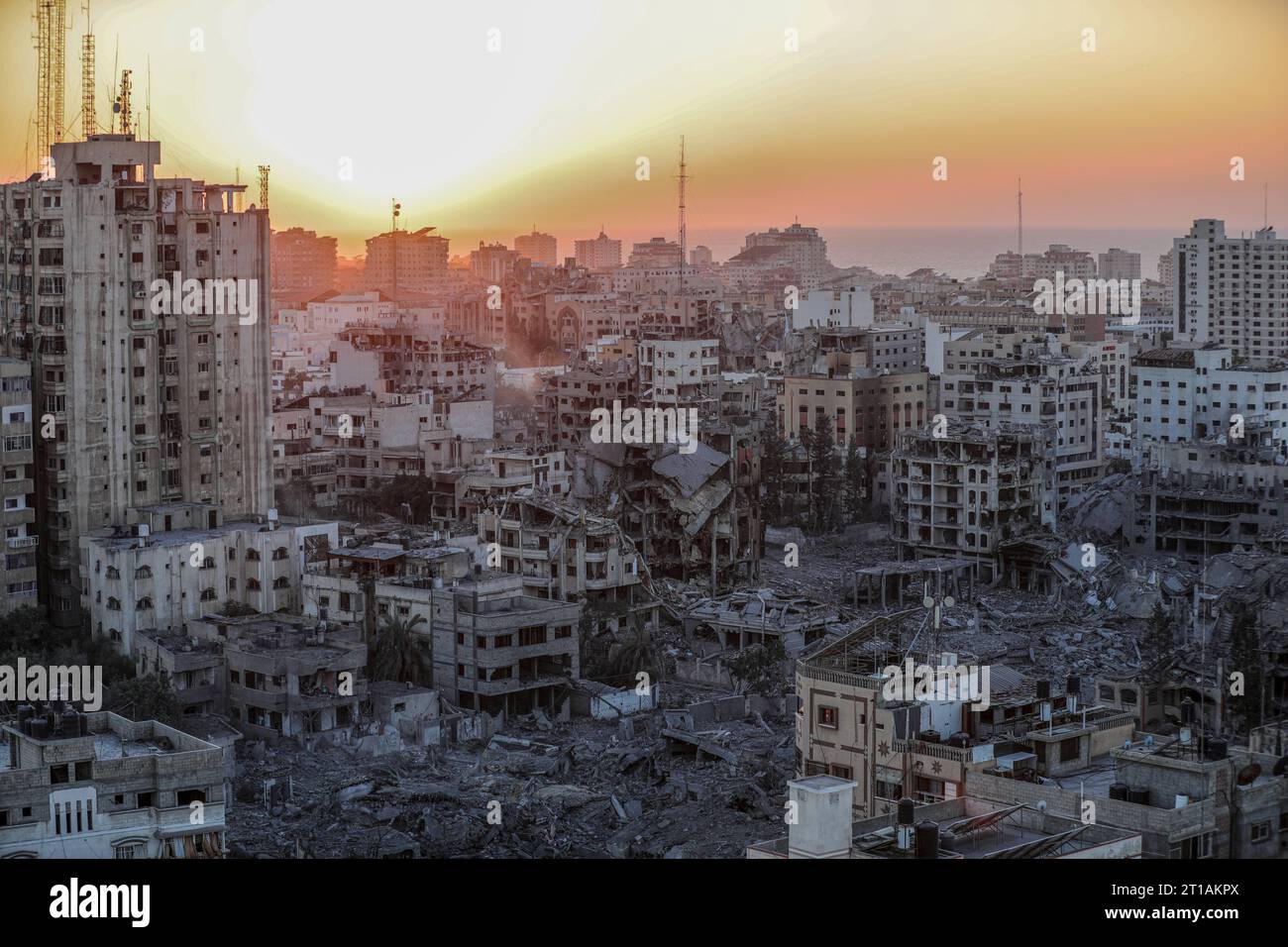 A view of ruins and demolished buildings following Israeli air strikes ...