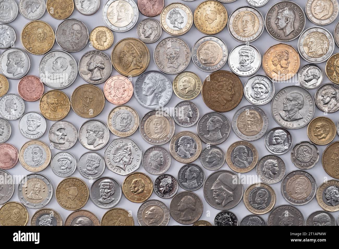 A lot of various money coins with portraits of famous people of ...