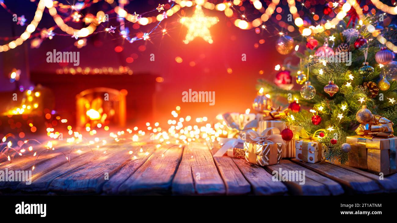 Present Below Christmas Tree With Garlands In Home Interior With ...