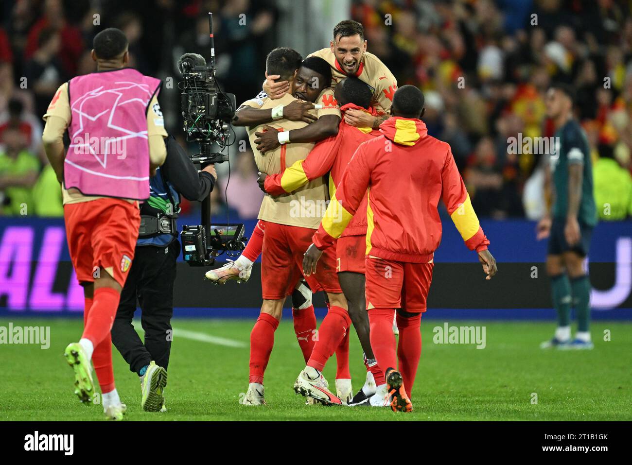 players of RC Lens celebrating after winning the Uefa Champions League ...