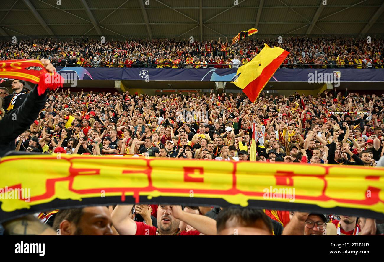 fans and supporters of Lens in tribune Delacourt celebrating after ...