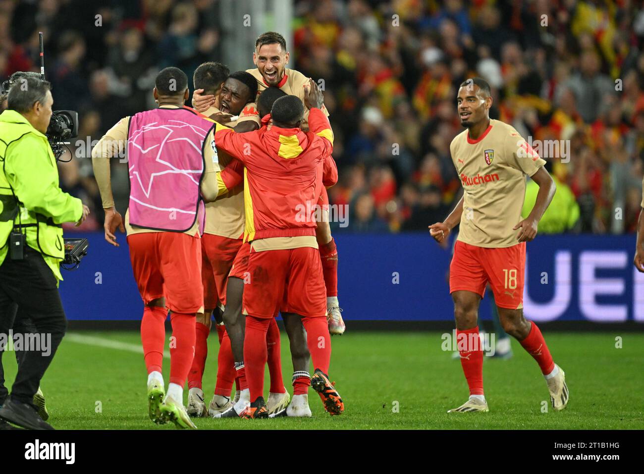 players of RC Lens celebrating after winning the Uefa Champions League ...