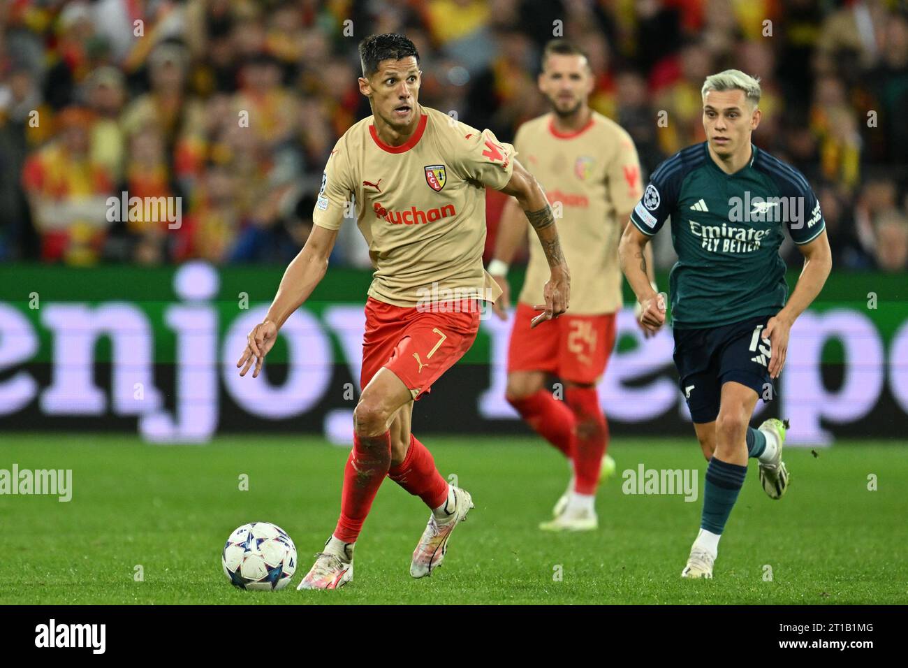 Leandro Trossard (19) of Arsenal defending on Florian Sotoca (7) of RC ...