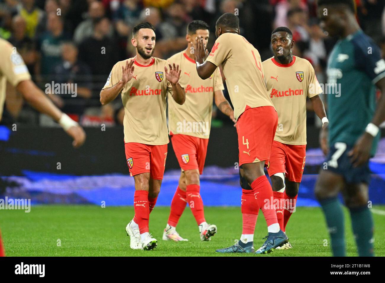 Adrien Thomasson (28) of RC Lens celebrates after scoring the 1-1 ...