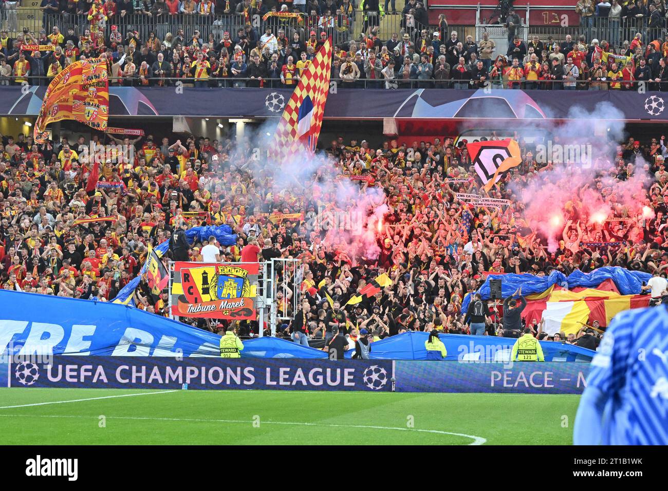 fans and supporters of Lens using pyrotechnical flares and fireworks ...