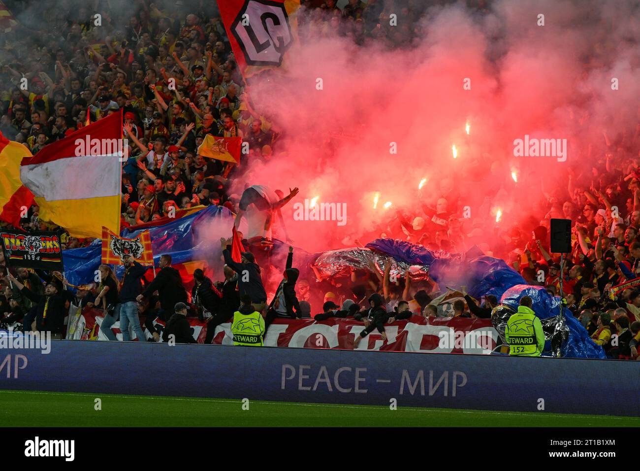 fans and supporters of Lens using pyrotechnical flares and fireworks ...