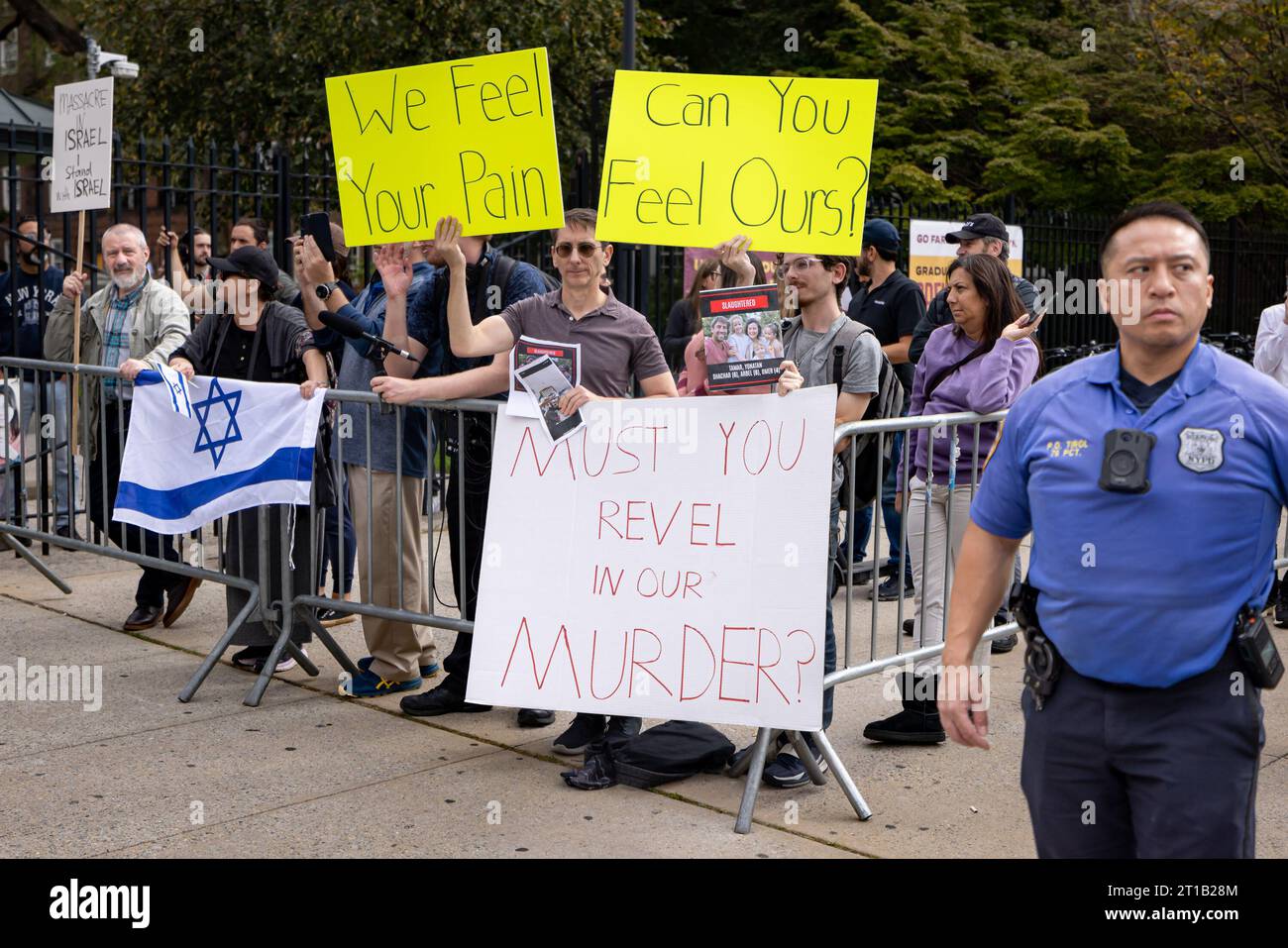 NEW YORK, NEW YORK - OCTOBER 12: Jewish counter protesters shout and ...