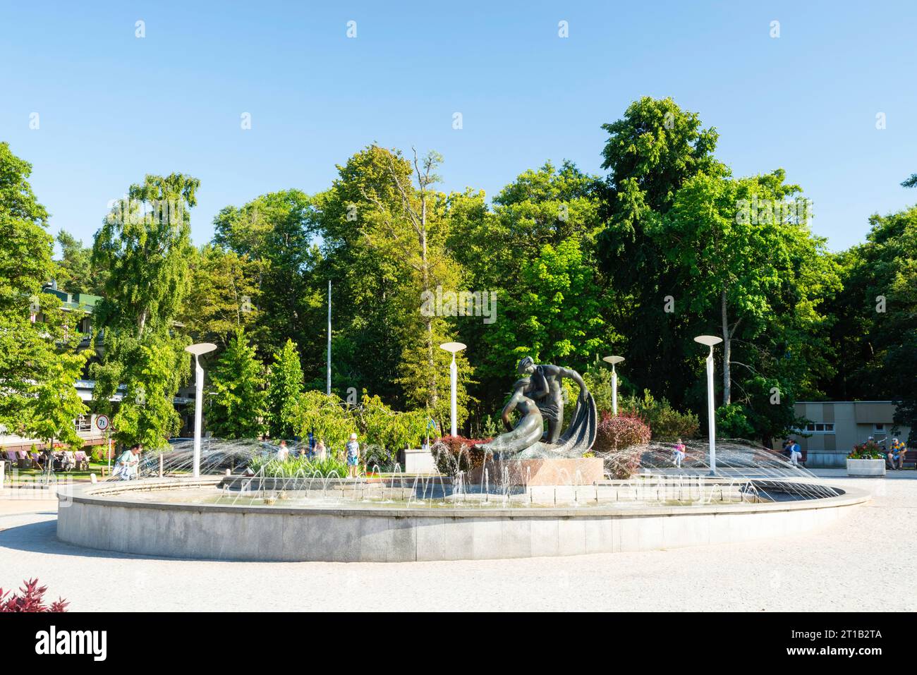 View of people enjoying their summer vacation along the promenade at ...
