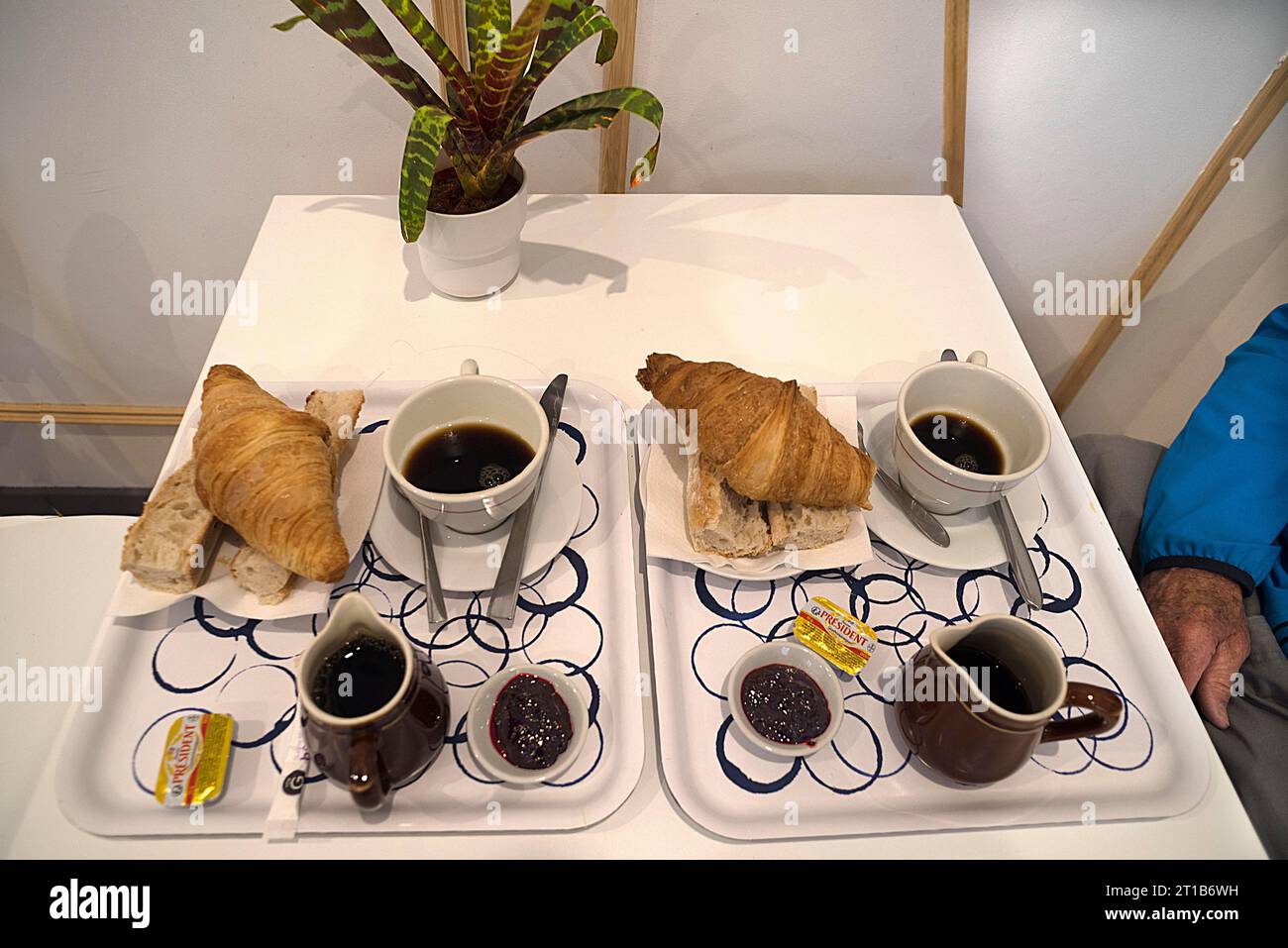 Typical French breakfast brioche and coffee in a budget hotel, Paris ...
