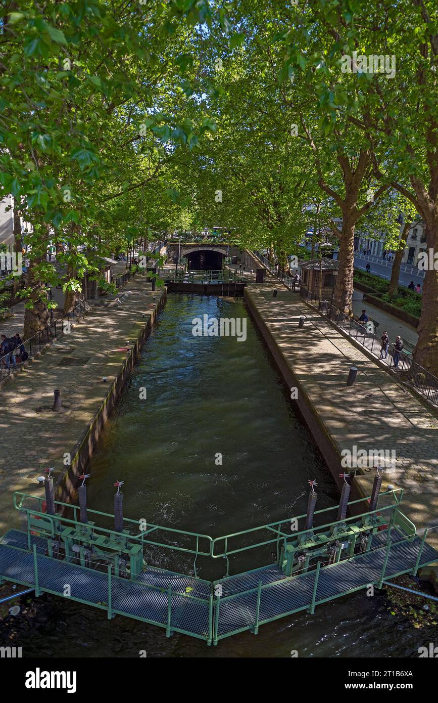 View of the Canal Saint-Martin with locks, waterway built by Napoleon ...
