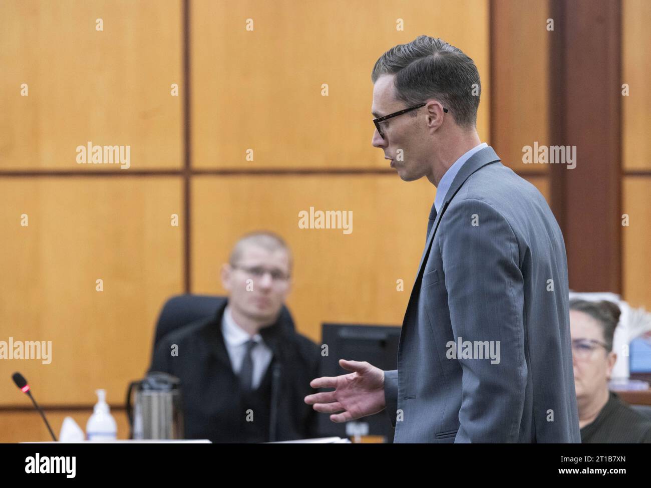 Defense attorney Mark Conrad, right, cross examines Jacob Atzet, a ...