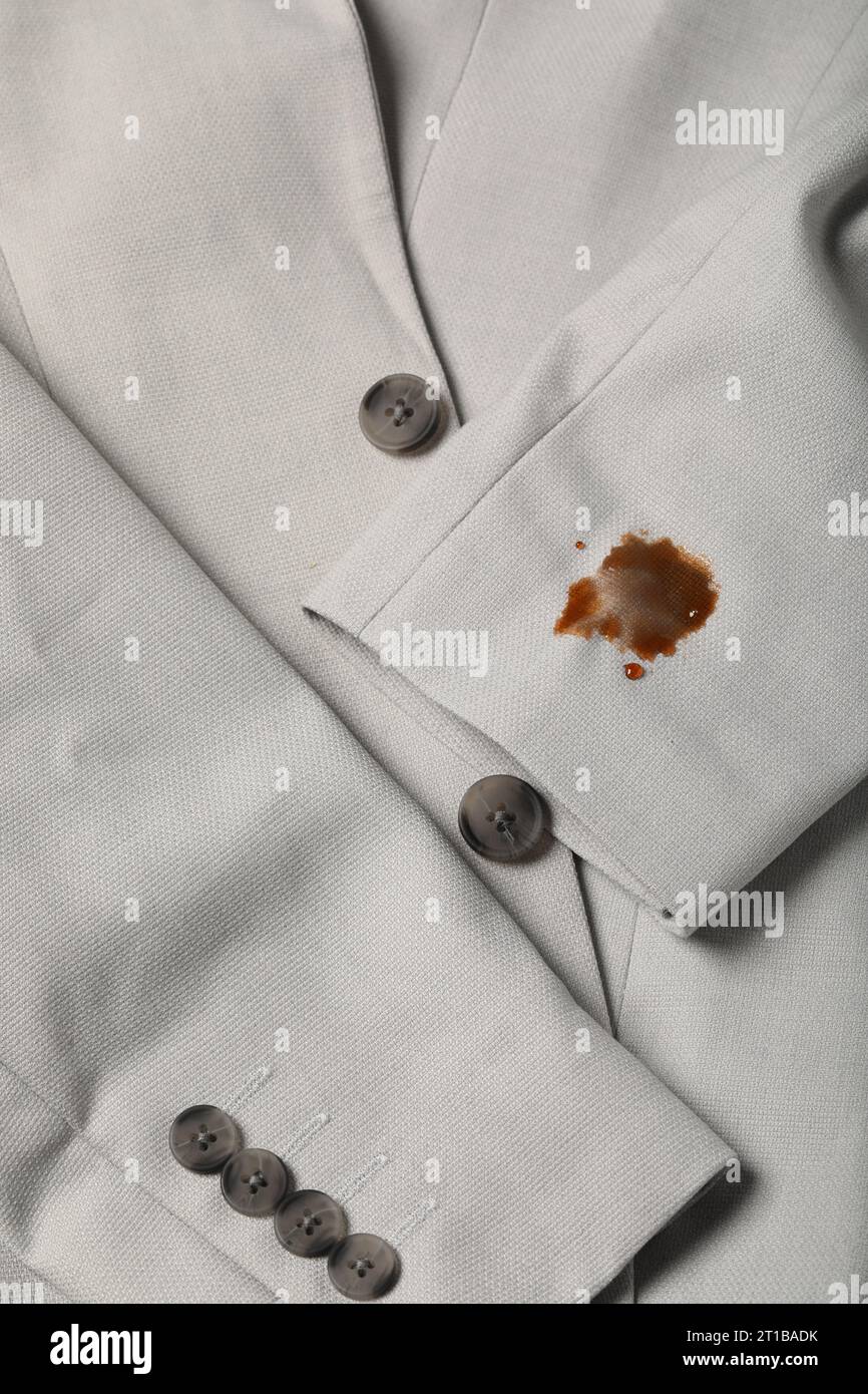 Dirty jacket with stain of coffee as background, closeup Stock Photo ...