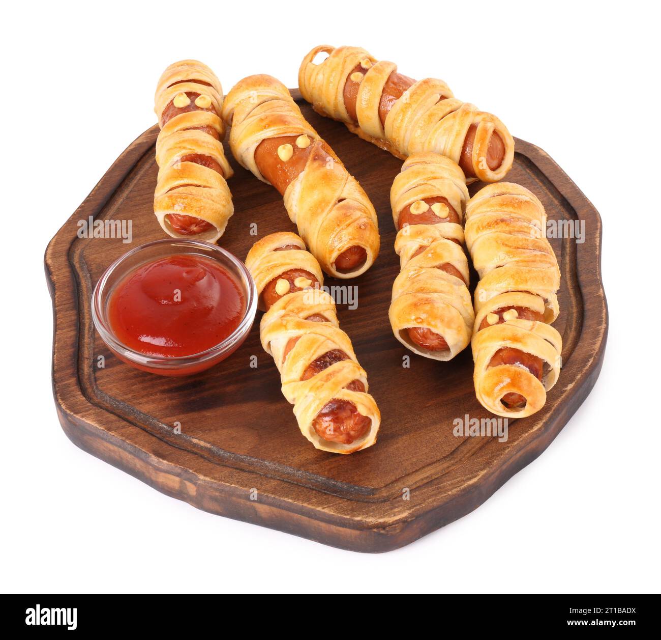 Cute sausage mummies served with ketchup isolated on white. Halloween ...