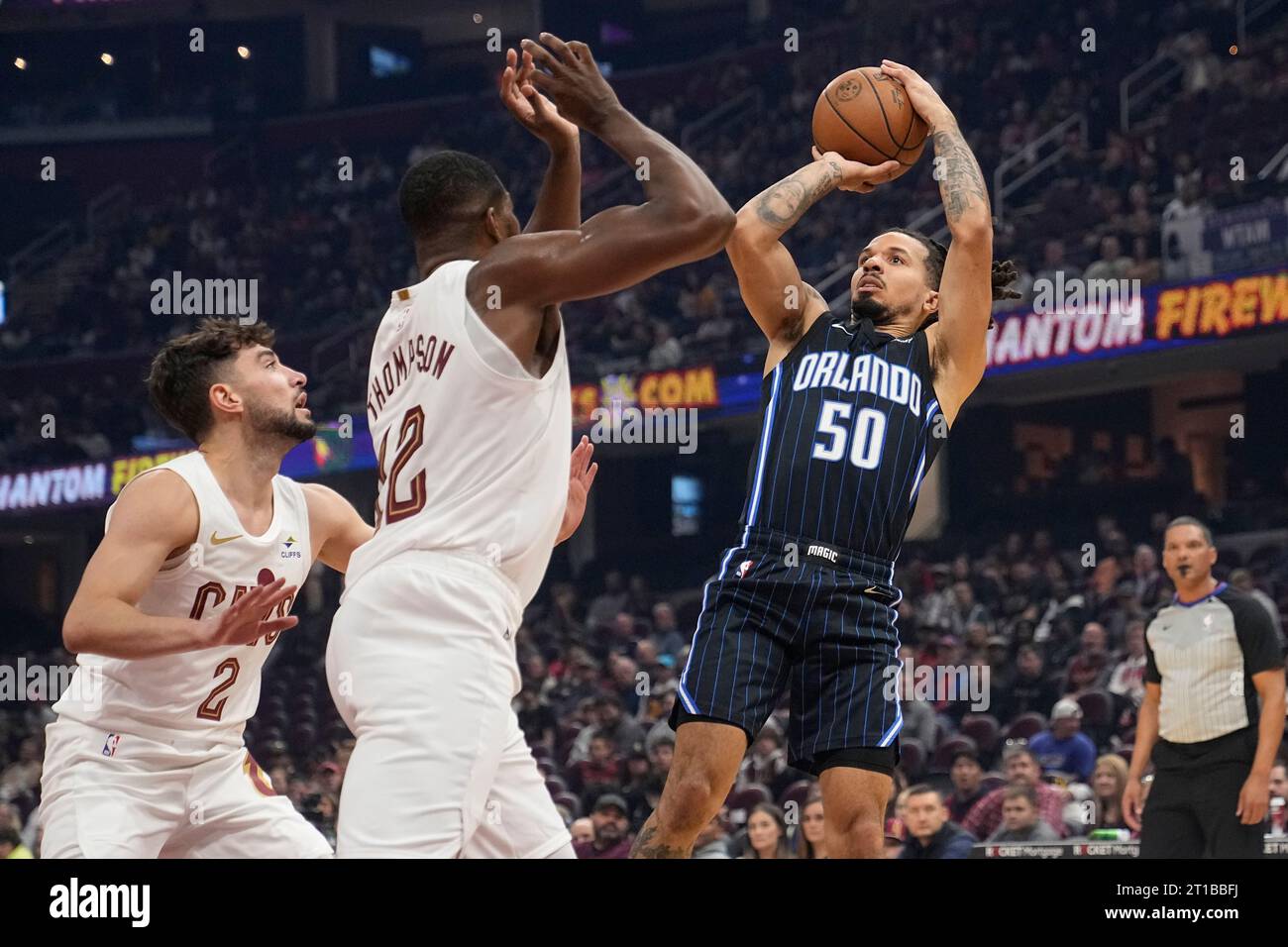 Orlando Magic's Cole Anthony (50) shoots as Cleveland Cavaliers' Ty ...