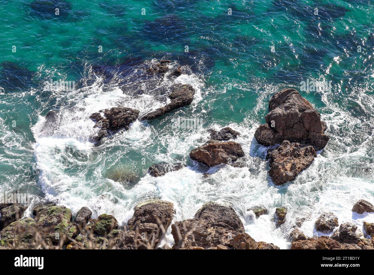 Incredibly clear ocean on the coastline of pacific ocean at Point Dume ...