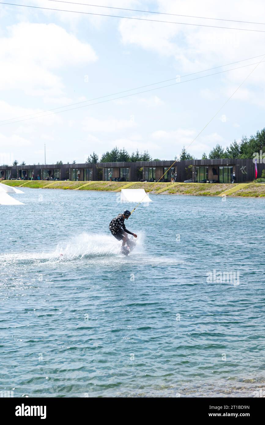 Young men grow their wake boarding skills at the 313 Cable Park, HBH v ...