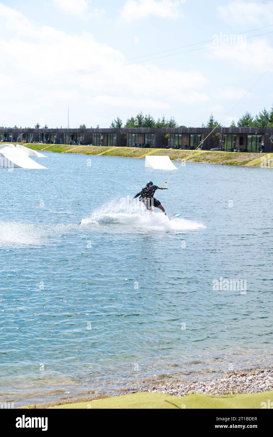 Young men grow their wake boarding skills at the 313 Cable Park, HBH v ...