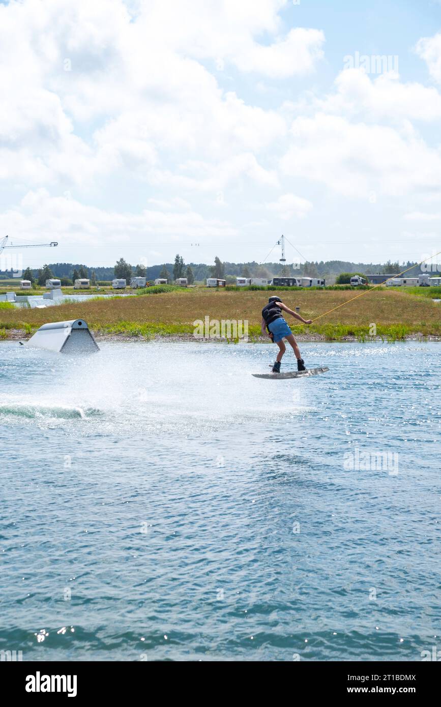 Young men grow their wake boarding skills at the 313 Cable Park, HBH v ...