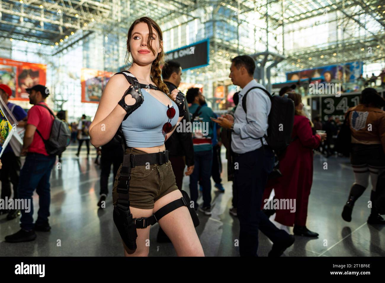 An attendee dressed as Lara Croft from Tomb Raider poses during New ...