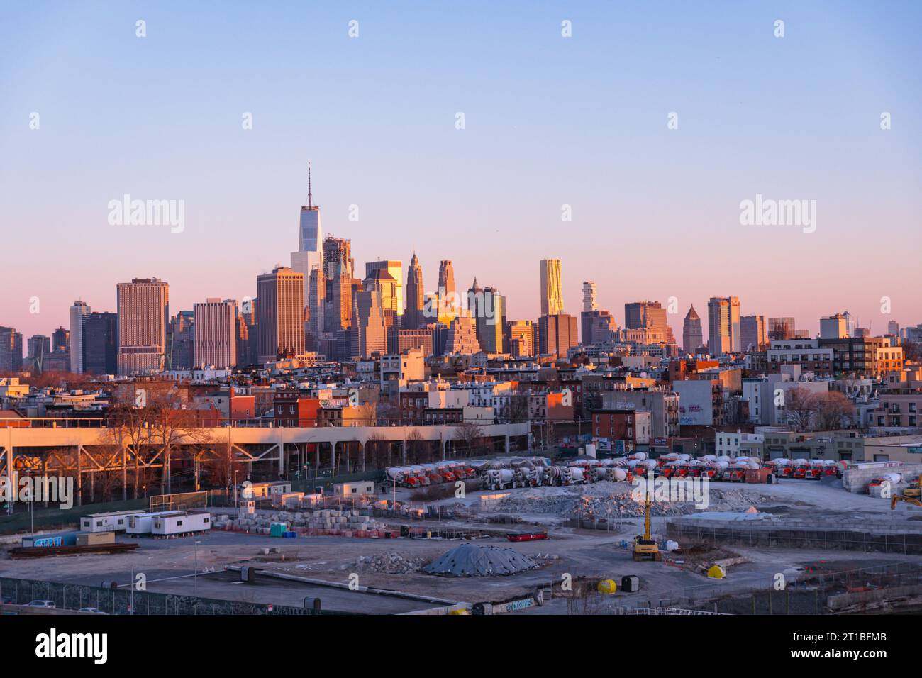 Rooftop view of elevated subway tracks and parking lot in Brooklyn with ...