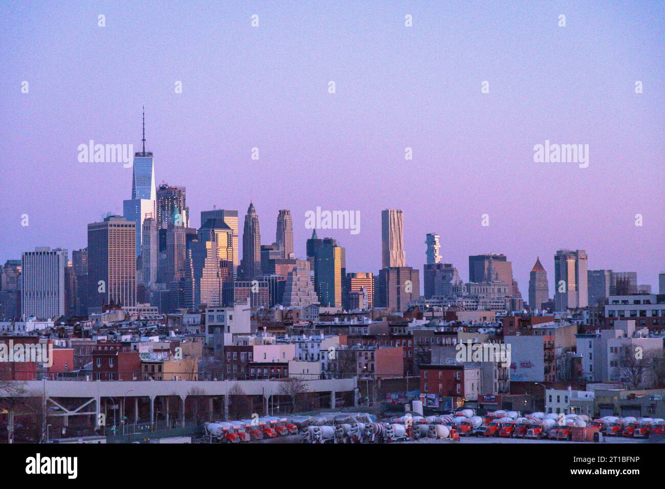 Rooftop view of elevated subway tracks and parking lot in Brooklyn with ...
