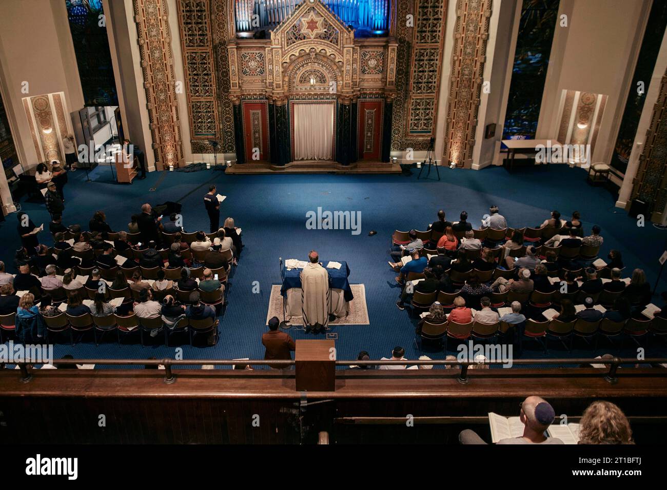Jews pray during a communal prayer to honor and offer support for the ...