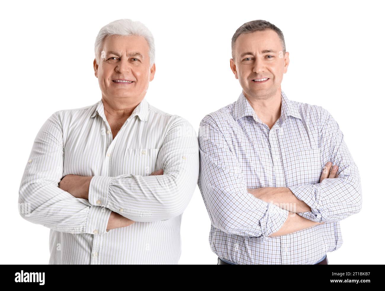 Mature brothers on white background Stock Photo - Alamy