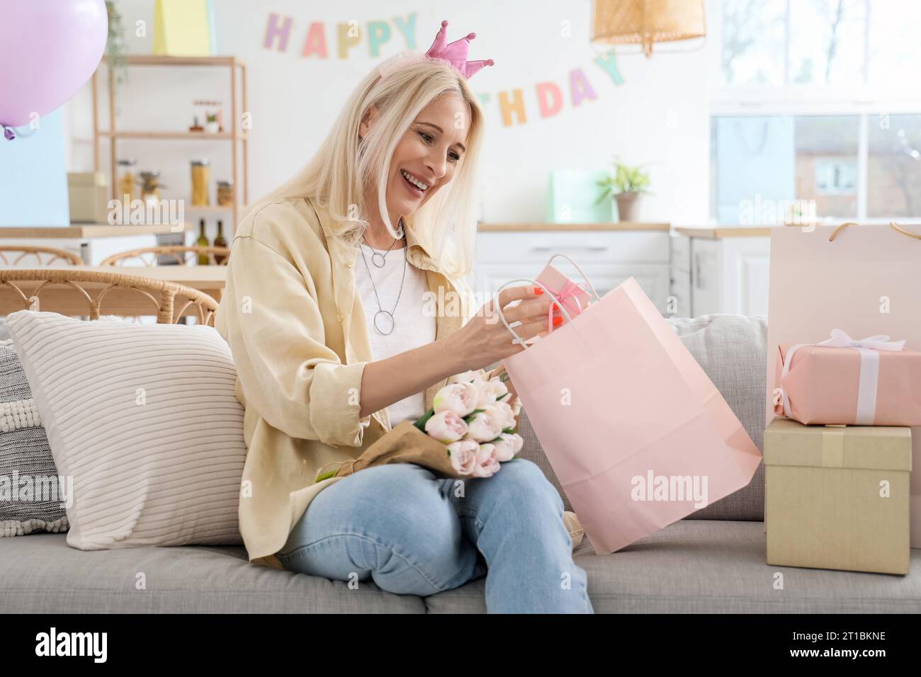 Mature woman taking greeting hi-res stock photography and images - Alamy