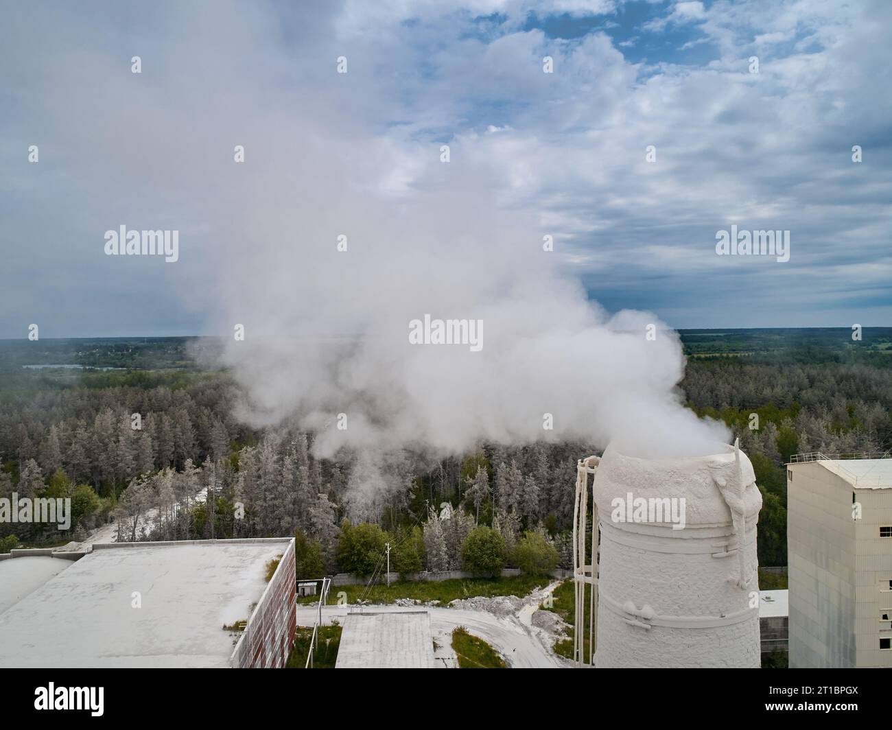 Calx roasting rotating furnace with pipe and steam at plant Stock Photo ...