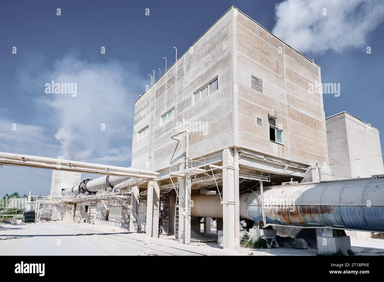 Building of loading device of roasting rotary furnace Stock Photo - Alamy
