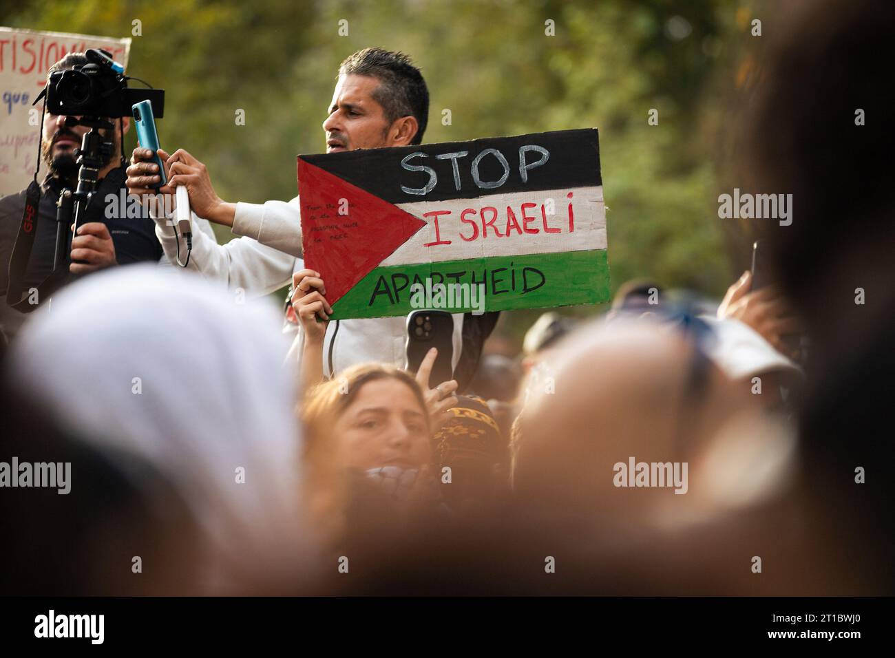 Paris, France. 12th Oct, 2023. A placard that says "Stop Israeli ...