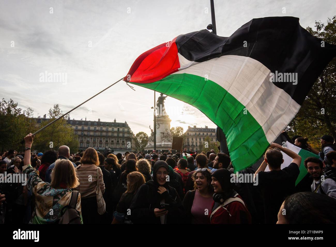 Paris, France. 12th Oct, 2023. A woman with a Palestine flag seen ...