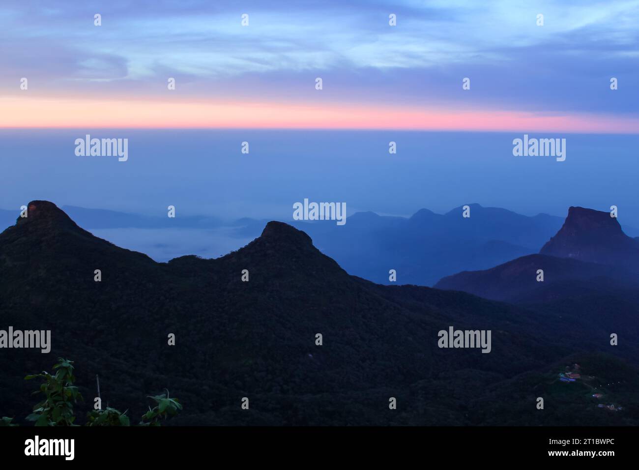 The three cone shape mountains and the magical sunrise sky at Adam's ...