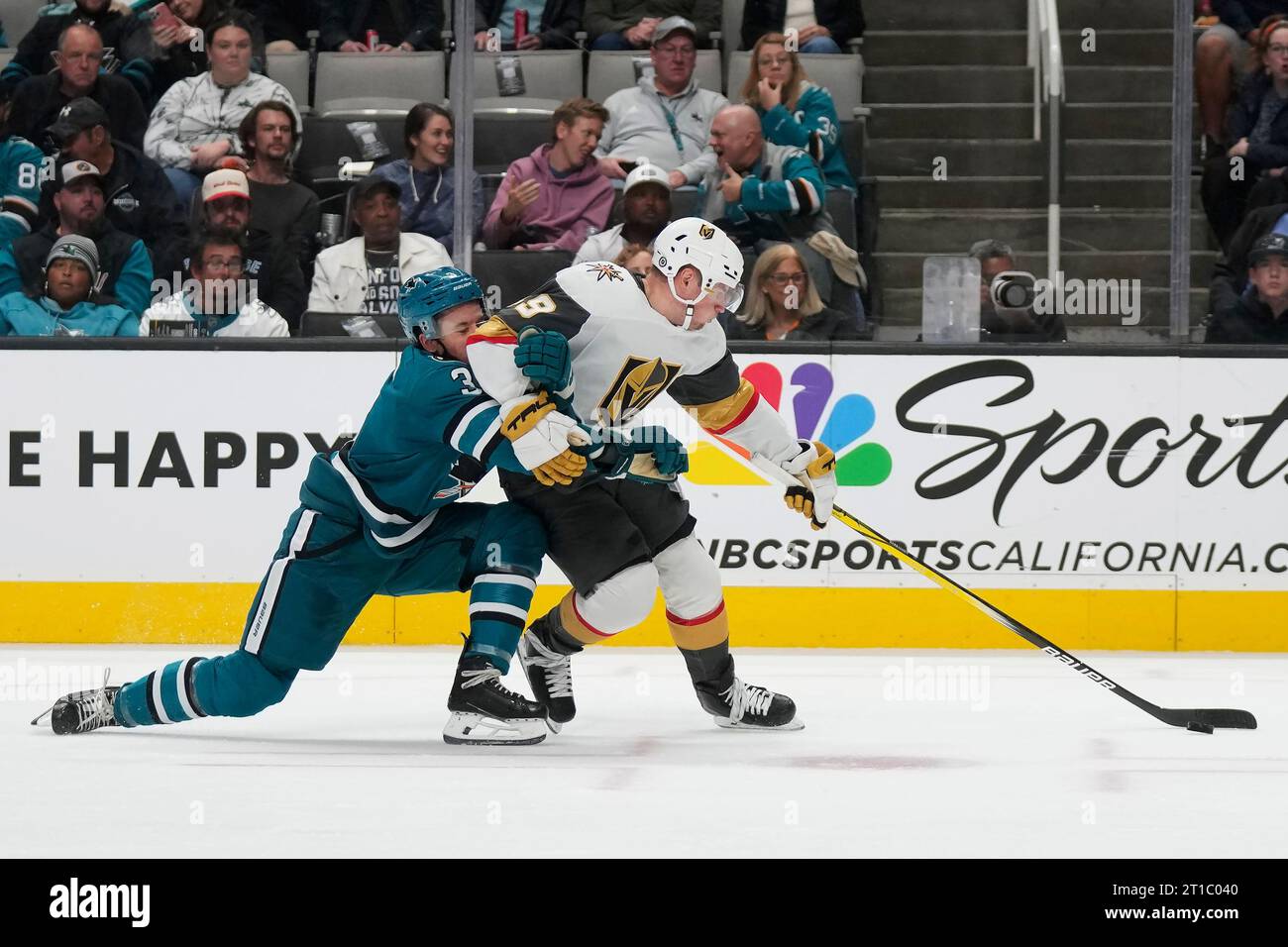 Vegas Golden Knights center Ivan Barbashev, right, reaches for the puck ...