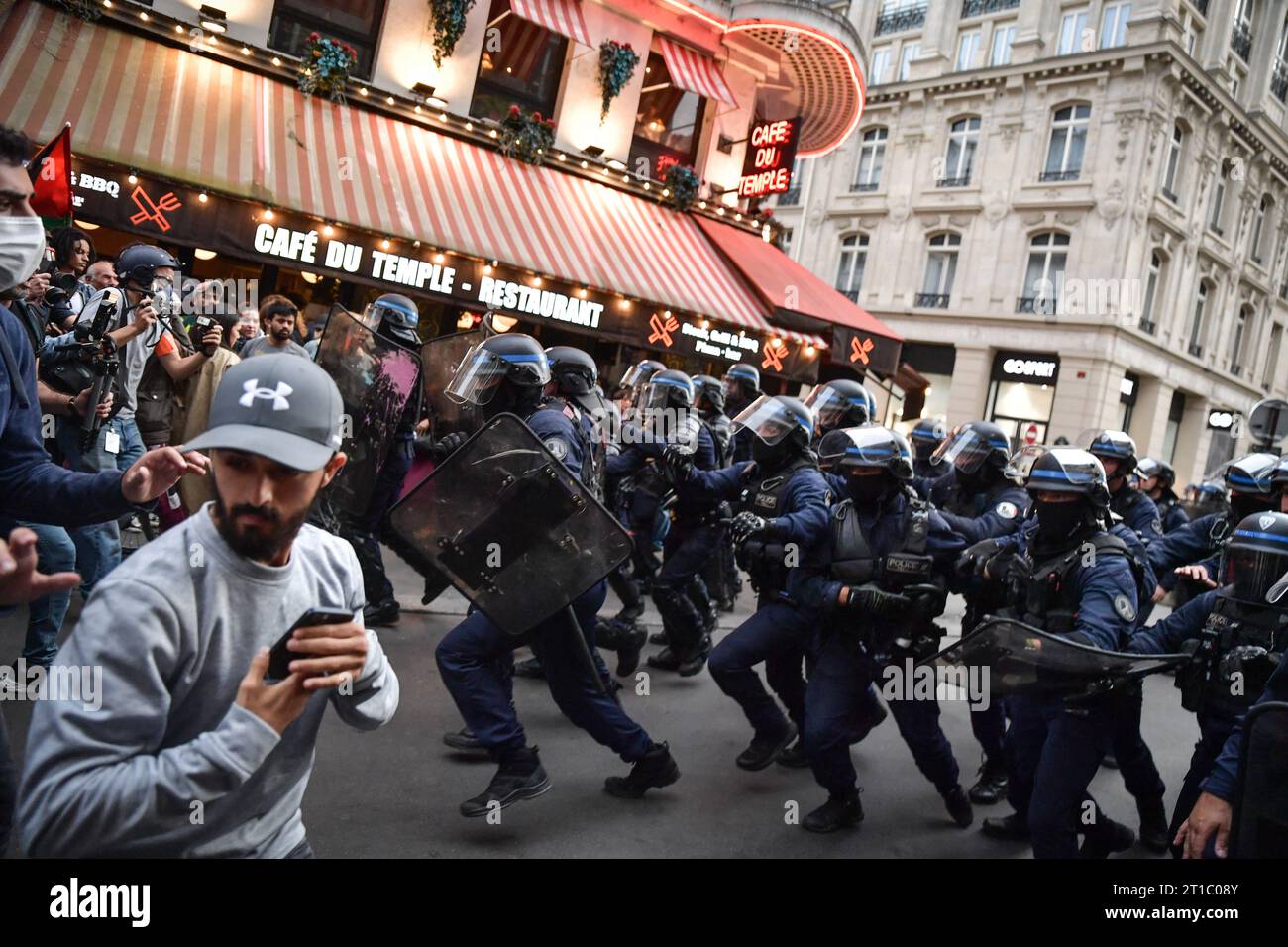 Clashes occur between protesters and riot police during an unauthorized ...