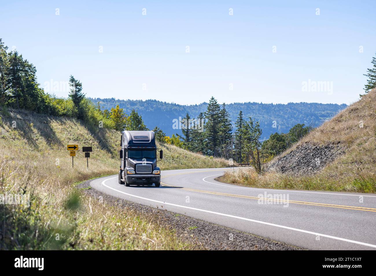 Industrial long hauler black carrier big rig semi truck tractor with ...