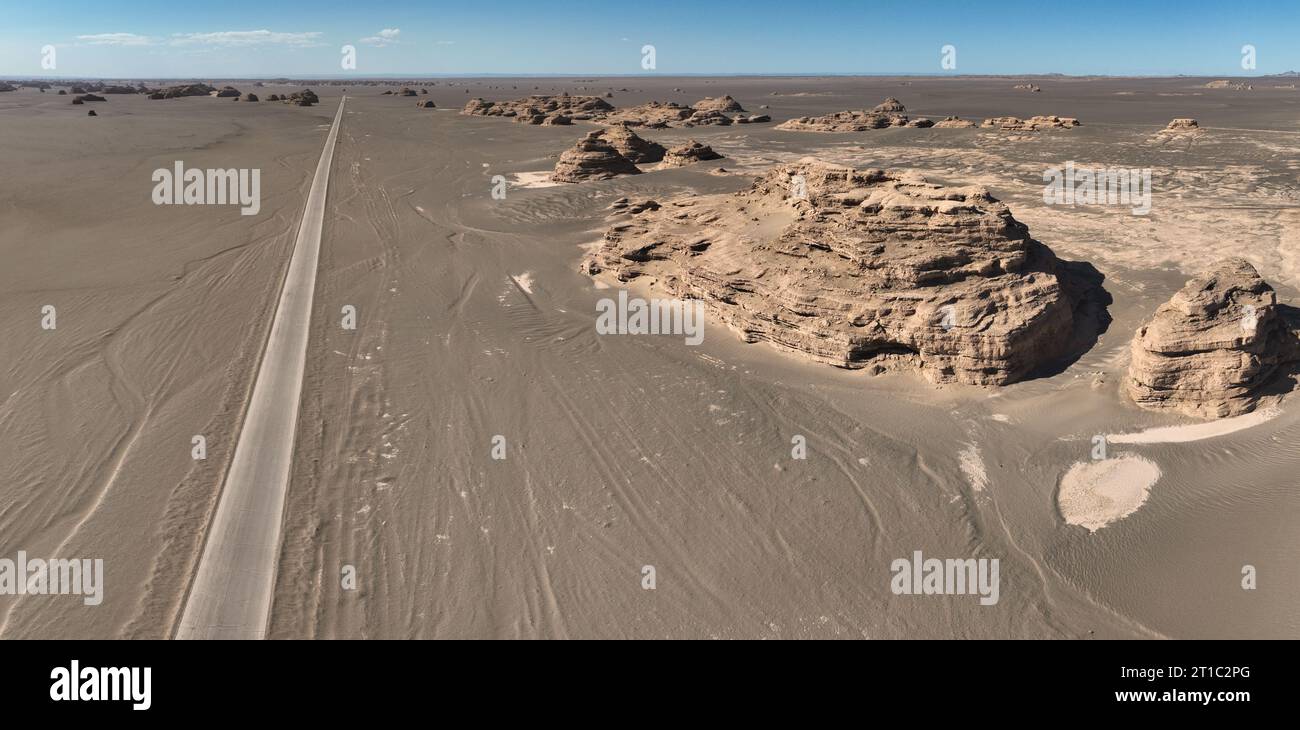 Photo of a breathtaking aerial view of a vast desert landscape with ...