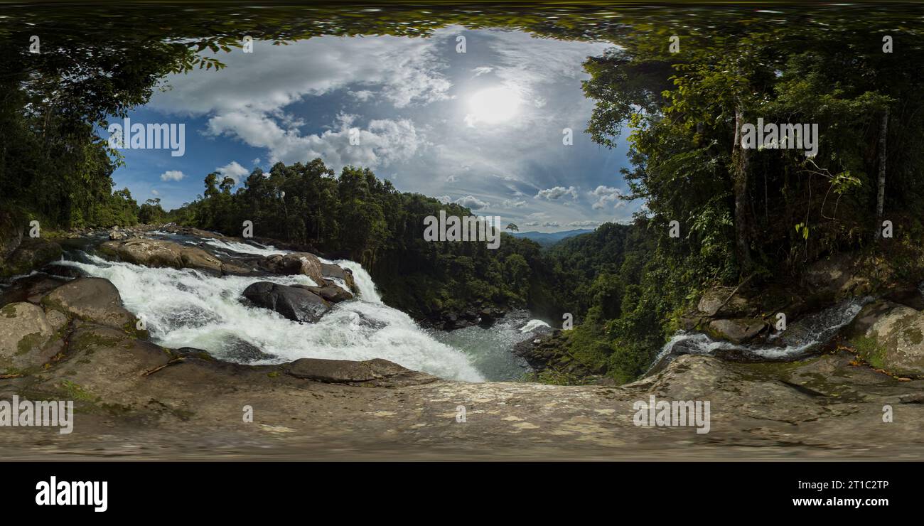 Water cascade over rocks in tropical mountain. Limunsudan Falls ...