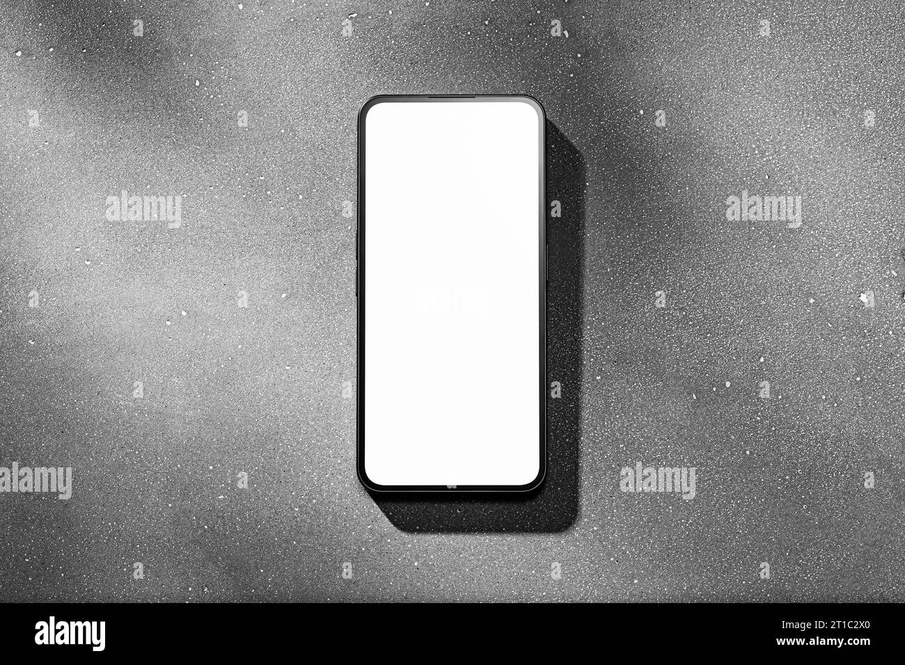 Smartphone on rough concrete stone background. Mobile phone mockup with ...