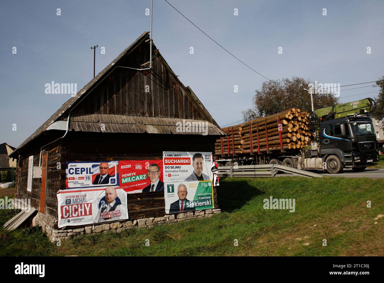 Political campaign banners are displayed in Gorno, Poland, Wednesday ...