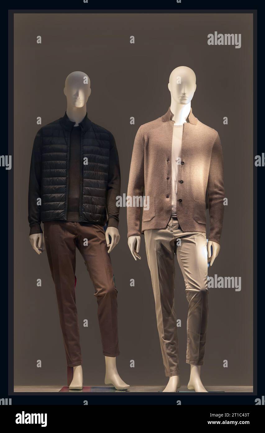 Shop windows and mannequins. Fashion Store exterior. City Night Boutique. Front View from street ...