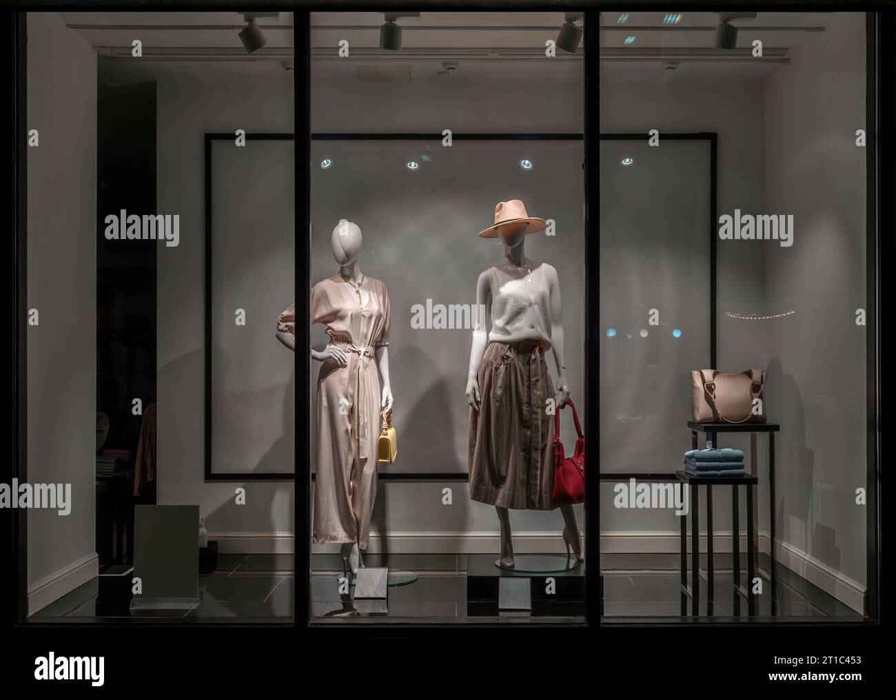 Shop windows and mannequins. Fashion Store exterior. City Night ...
