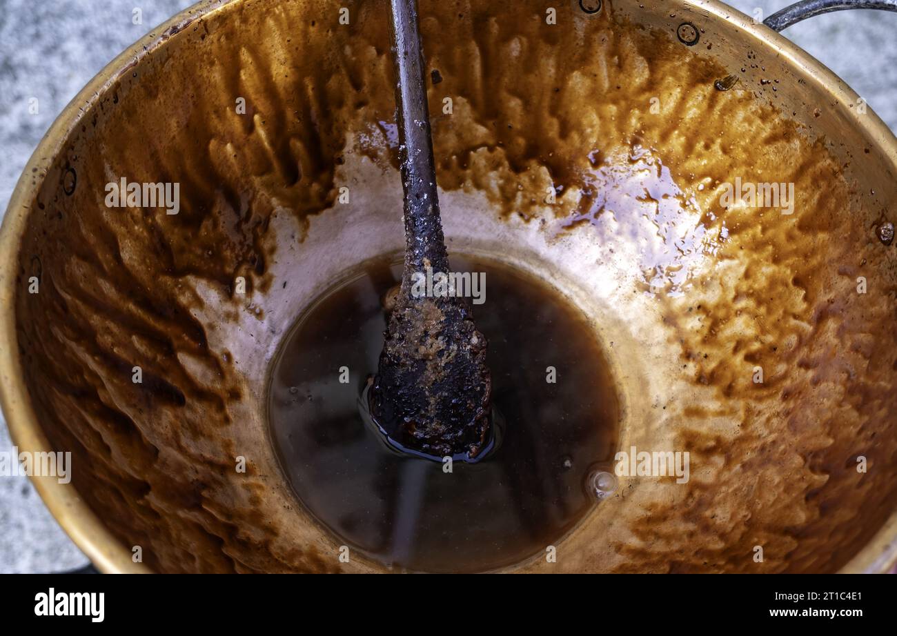 Detail of melted sugar in a copper pot, sweet Stock Photo - Alamy