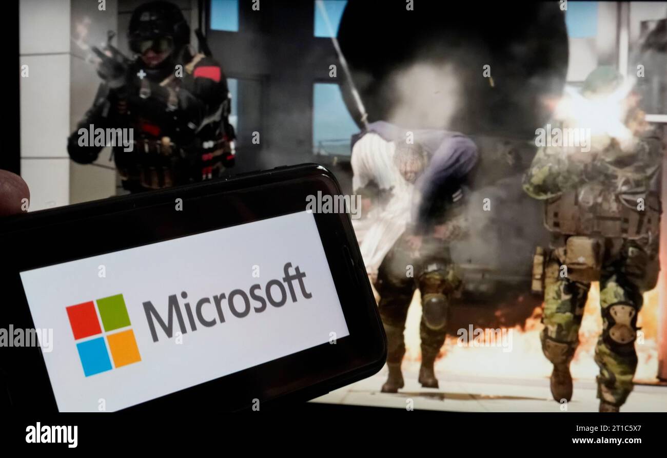 FILE - The logo for Microsoft, and a scene from Activision "Call of ...