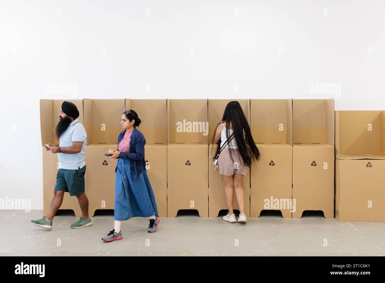Perth, Australia. 13th Oct, 2023. Voters are seen during a visit to an ...