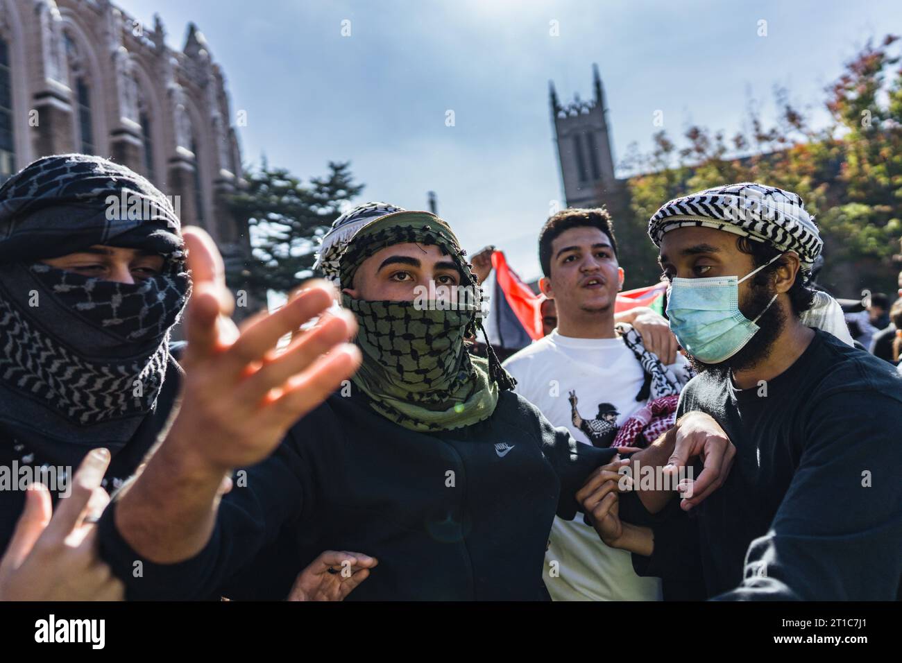 In a tense moment at the event, a man, draped in an Israeli flag ...