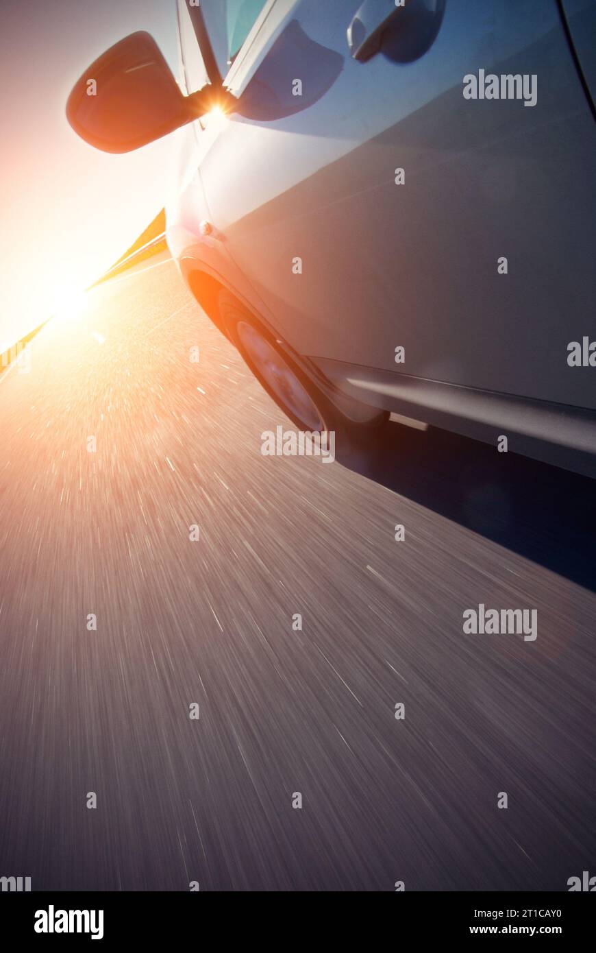 The car moves at fast speed at sunrise Stock Photo - Alamy