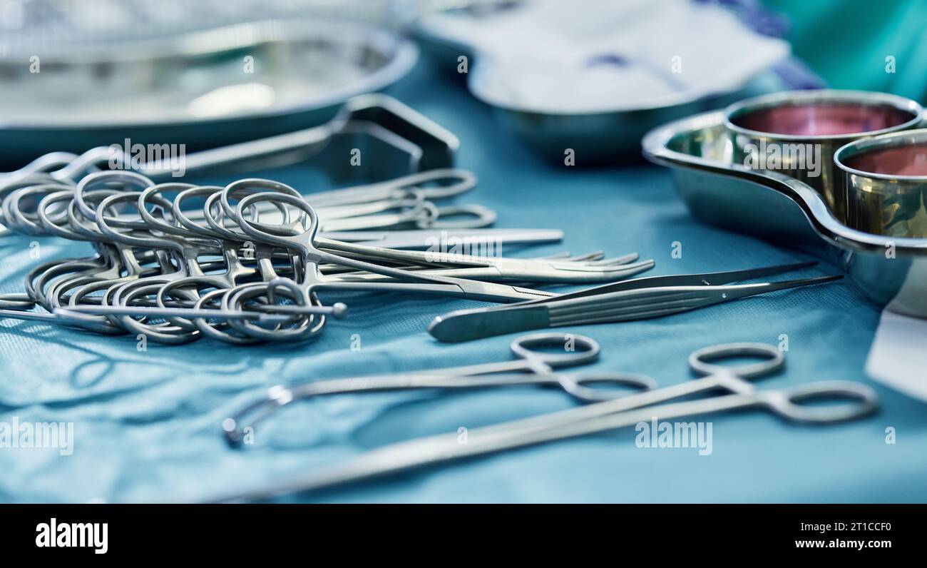 Background, surgery and metal tools in operating room for hospital ...