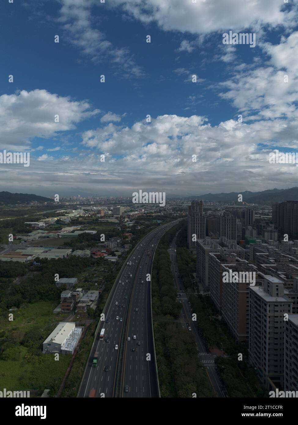Aerial view of Sanxia District with cars on highway in New Taipei City ...